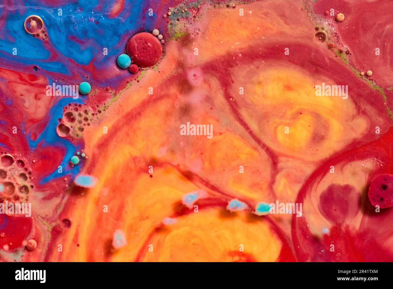 Background asset oil sphere bubbles on vibrant sea of colors swirling ...