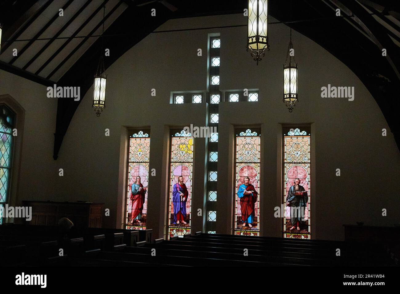 Mosaic-stained glass religious windows saints holding quills and bibles ...