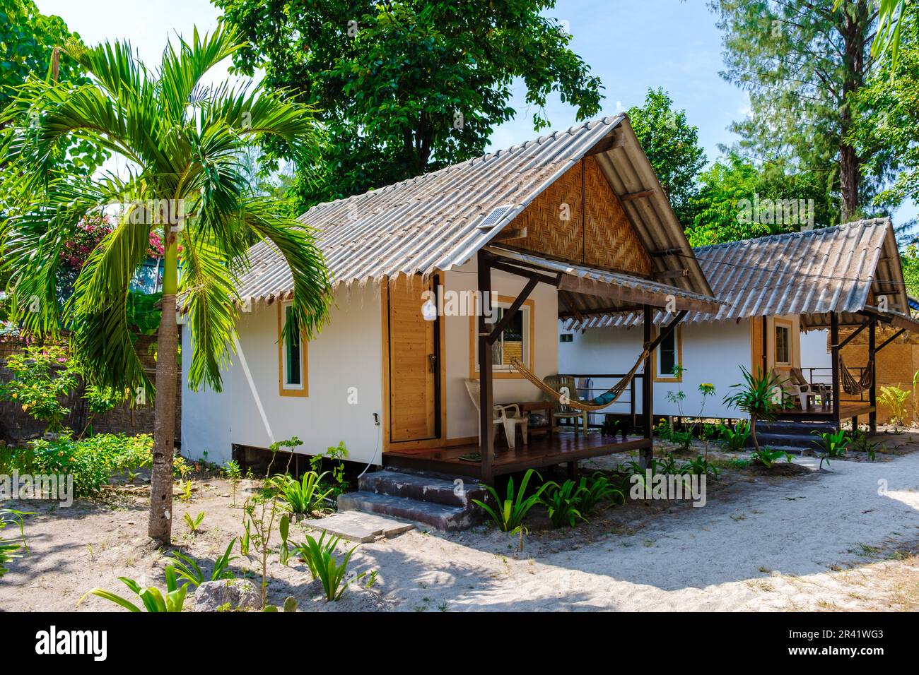 Bamboo hut bungalows on the beach in Thailand Stock Photo - Alamy