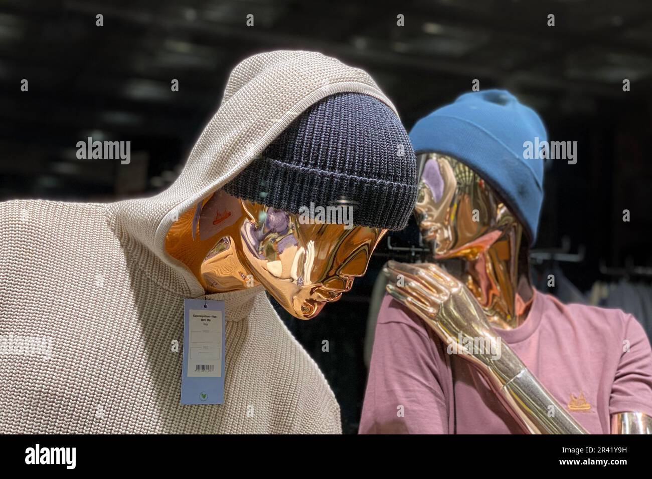 Golden Mannequins in Fashion Display with Stylish Attire Stock Photo ...