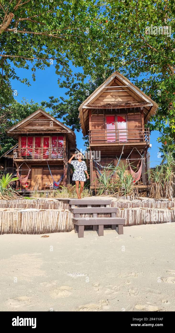 Bamboo hut bungalows on the beach in Thailand Stock Photo - Alamy