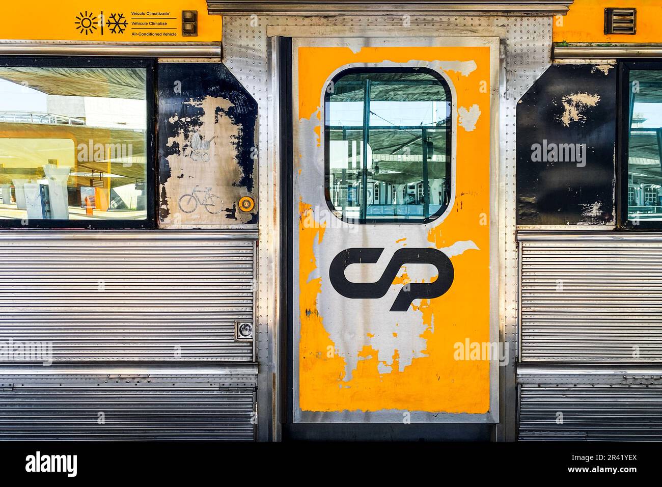 Weathered Yellow Train Door with CP Logo at Railway Station Stock Photo ...