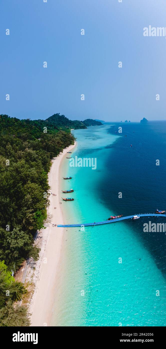 Longtail boat in turqouse colored hi-res stock photography and images ...