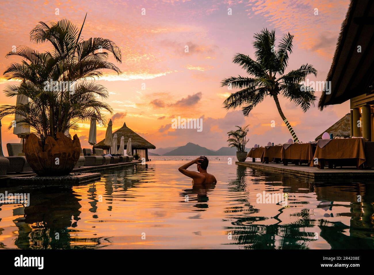 Luxury swimming pool in tropical resort, relaxing holidays in ...