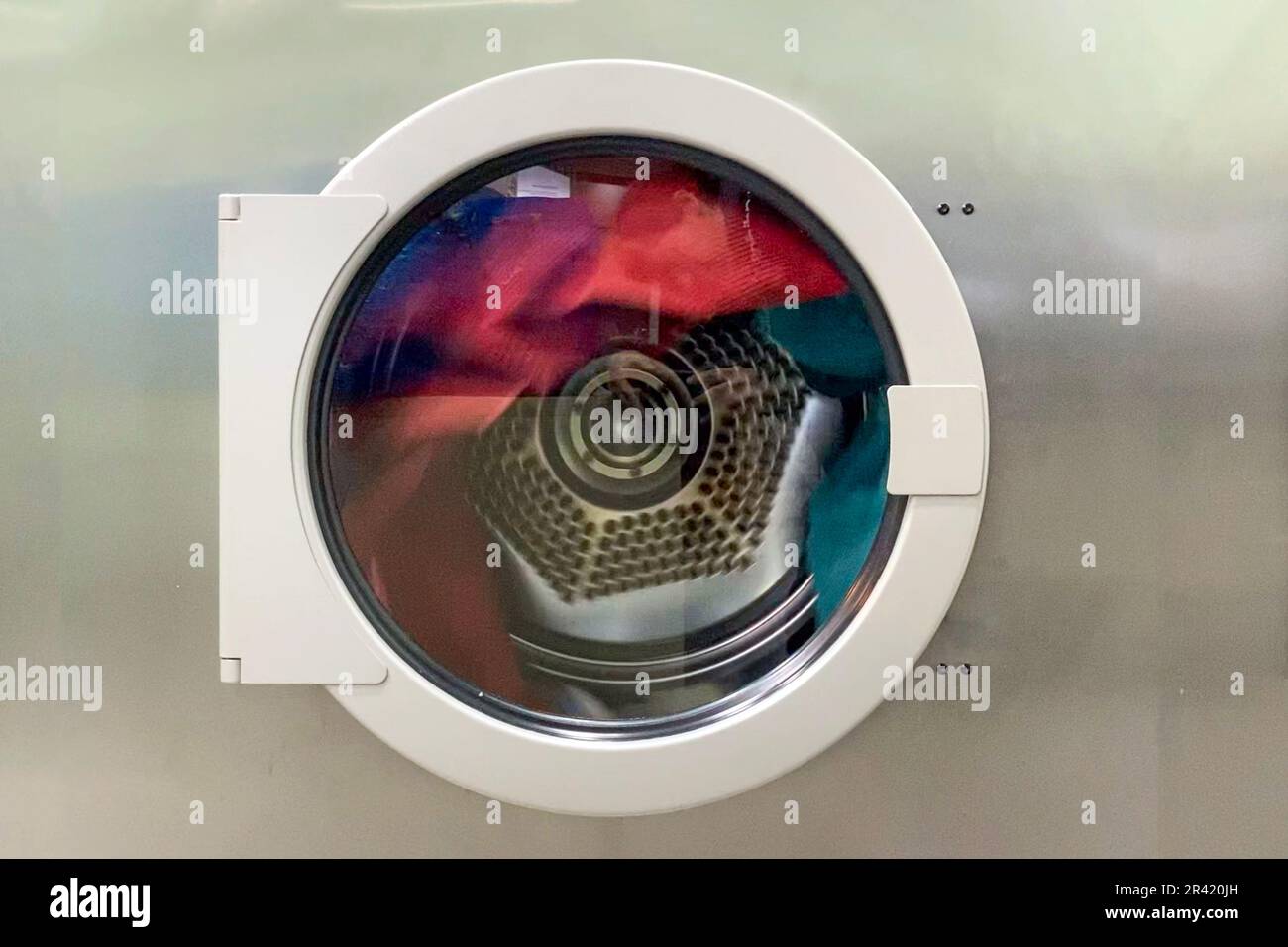 Sel-service dryer working. Laundry Stock Photo - Alamy