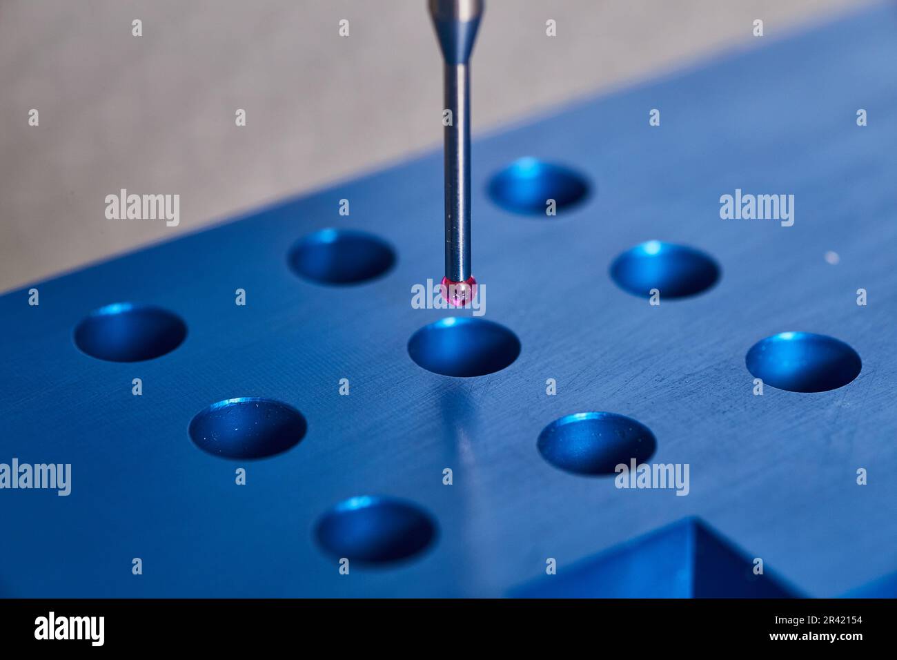 Metal machinery part scanned by CMM probe machine for minute flaws CMM ...