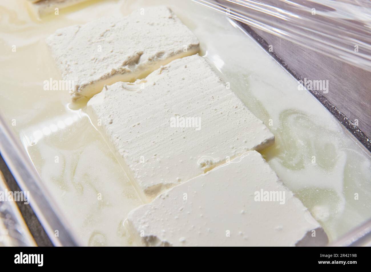 Top down view of container of Krinos Bulgarian Feta white cheese made ...