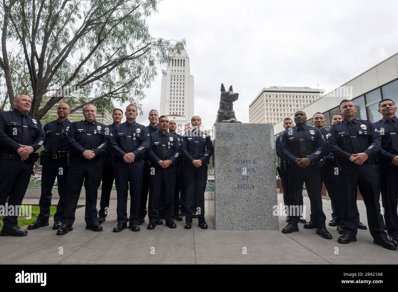 Los Angeles Police Metro K-9 Platoon members next to the new bronze ...