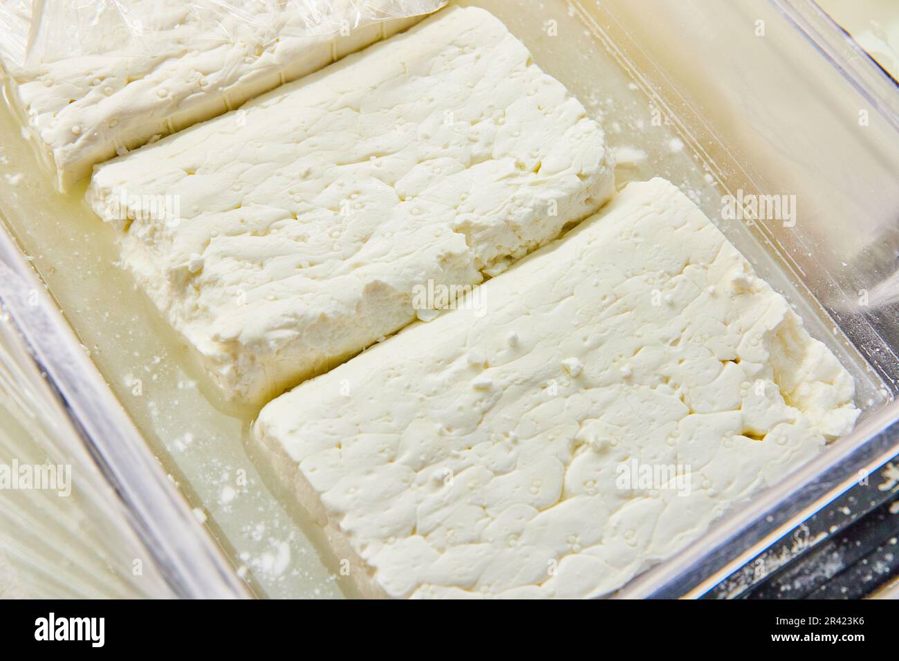 Top down view of container of Krinos Domestic Greek Feta white cheese ...