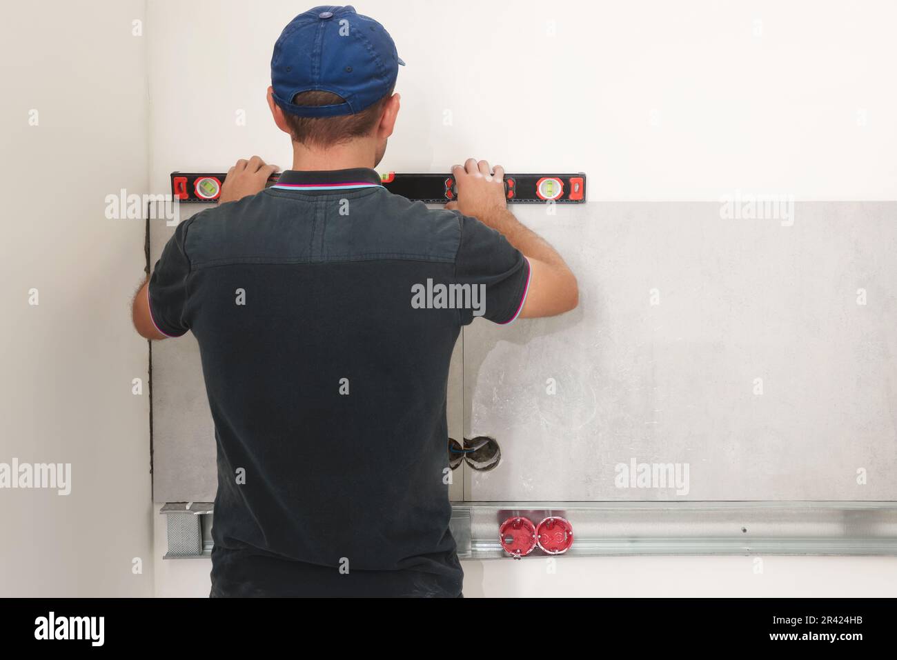 Installing the tiles hi-res stock photography and images - Alamy