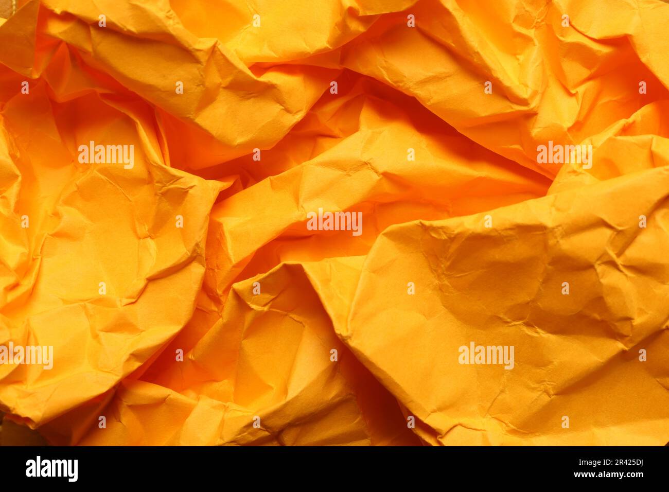 Texture of orange crumpled paper as background, closeup Stock Photo - Alamy