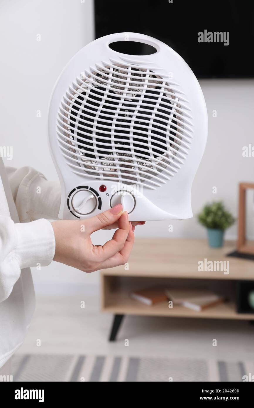 Woman electrical fan hi-res stock photography and images - Alamy
