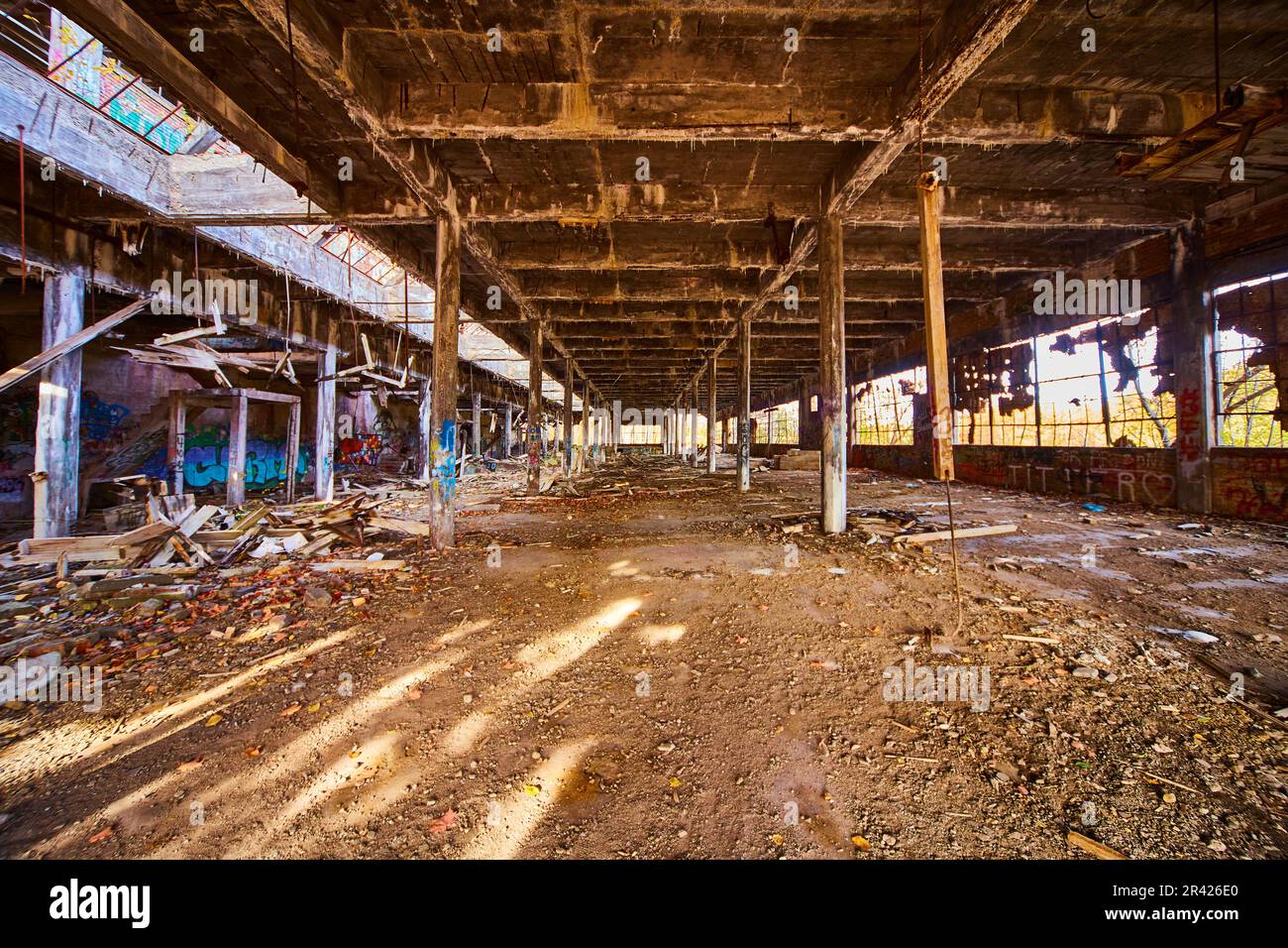 Abandoned falling apart building in collapse textured walls and rubble ...