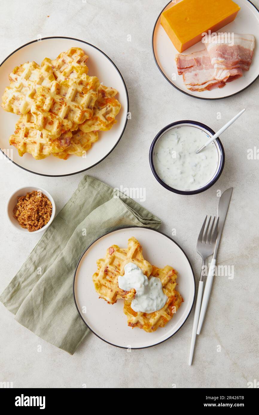 Snack waffles with bacon, cheddar cheese and dried fried onions and ...
