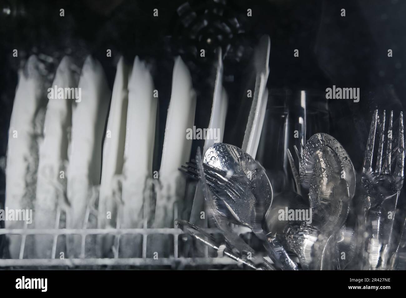 Inside view dishwasher washing dishes hi-res stock photography and ...