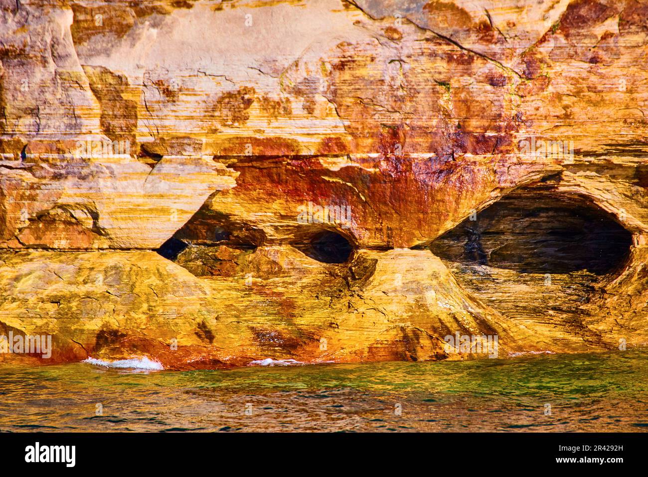 Caves and hollow caverns inside Pictured Rocks and ominous rusty water ...