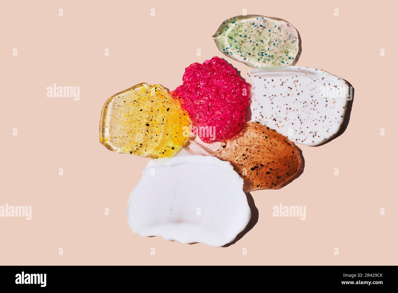 Different cosmetic products Swatches set with particles. Face or body ...