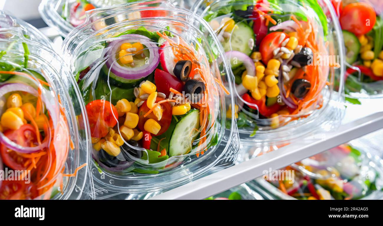 Plastic boxes with pre-packaged vegetable salads Stock Photo - Alamy
