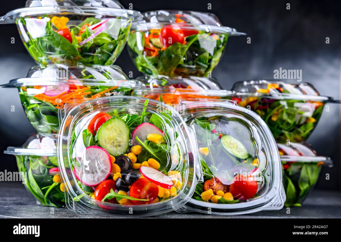 Plastic boxes with pre-packaged vegetable salads Stock Photo - Alamy
