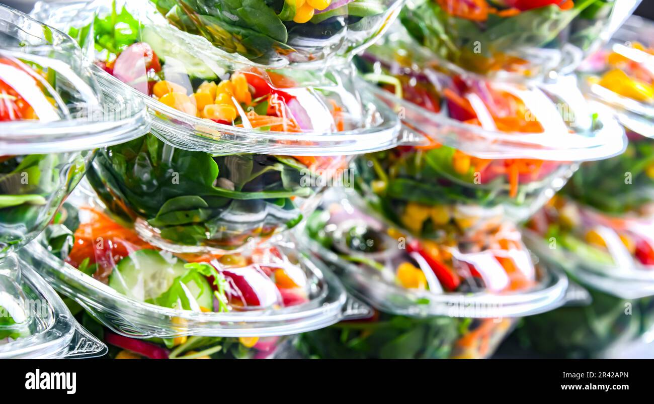 Plastic boxes with pre-packaged vegetable salads Stock Photo - Alamy