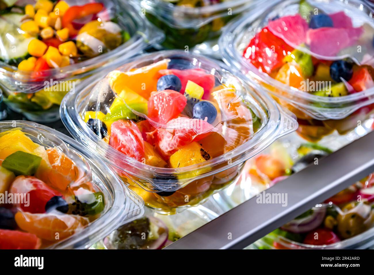 Plastic boxes with pre-packaged fruit salads Stock Photo - Alamy