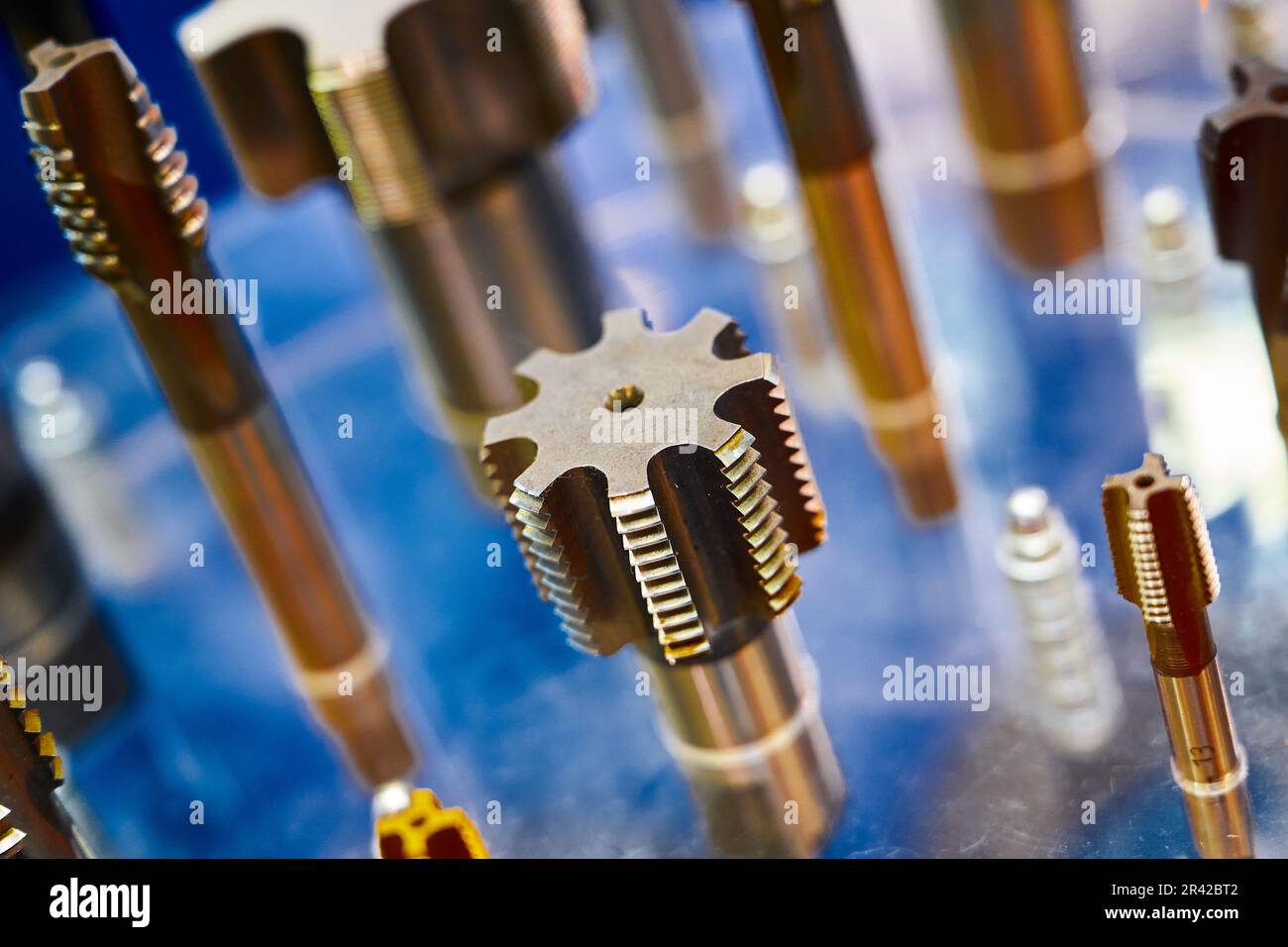 Various size roll forming taps exposed in hardware store Stock Photo ...