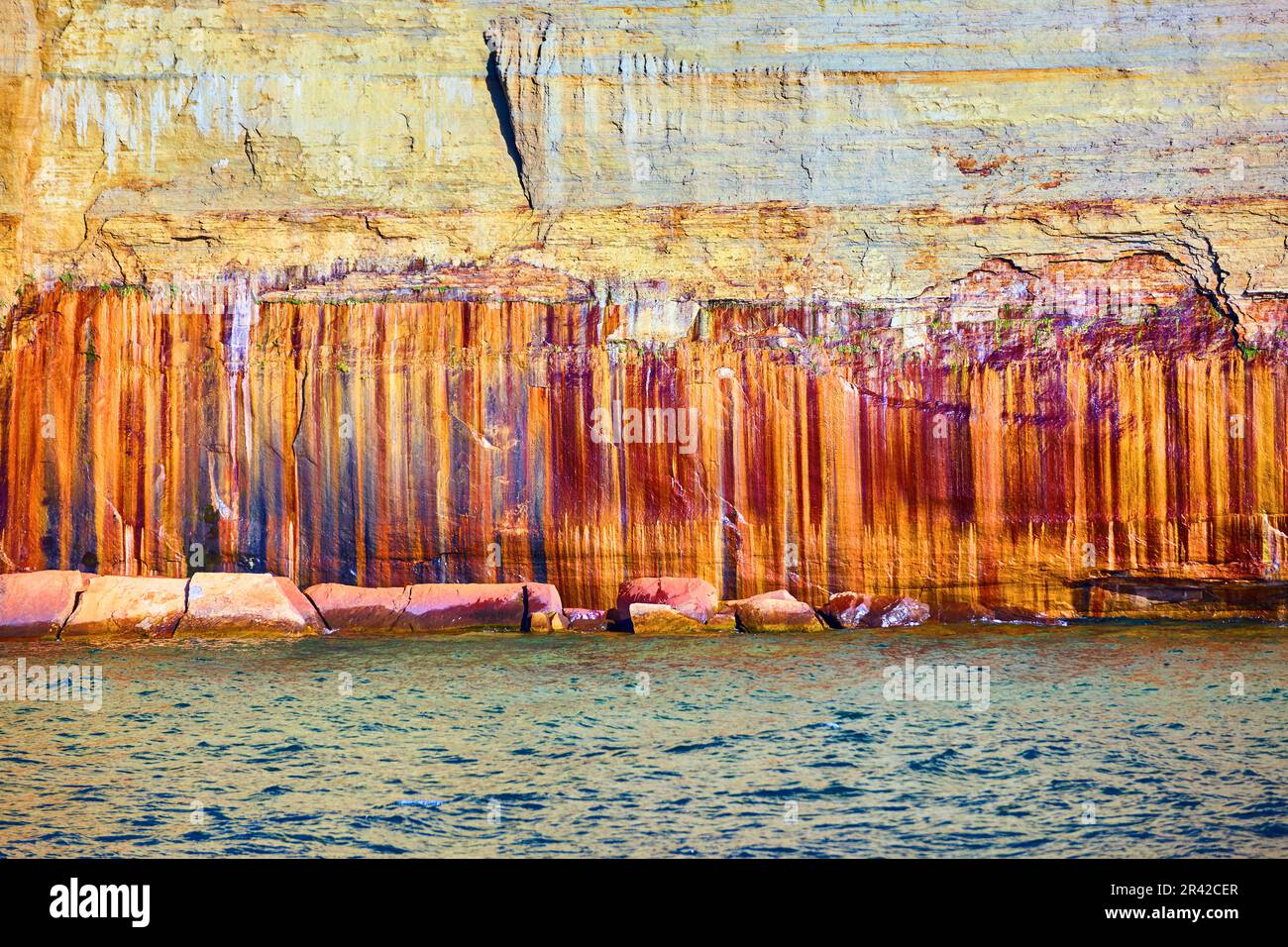 Iron streaks in Pictured Rocks with rusty red stone and white-gold ...