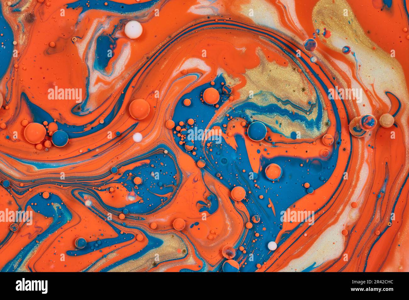 Swirling oil spill abstract painting with gold blue and orange acrylic ...