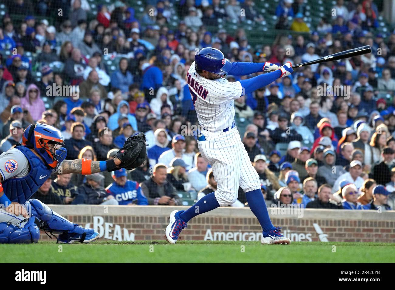 Chicago Cubs' Dansby Swanson hits a solo home run during the first inning of the team's baseball ...