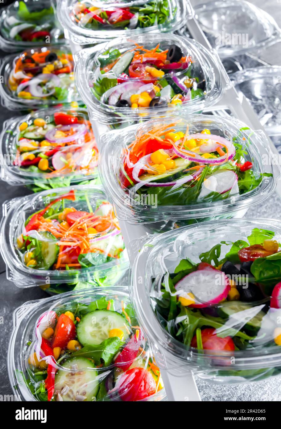Plastic boxes with pre-packaged vegetable salads Stock Photo - Alamy