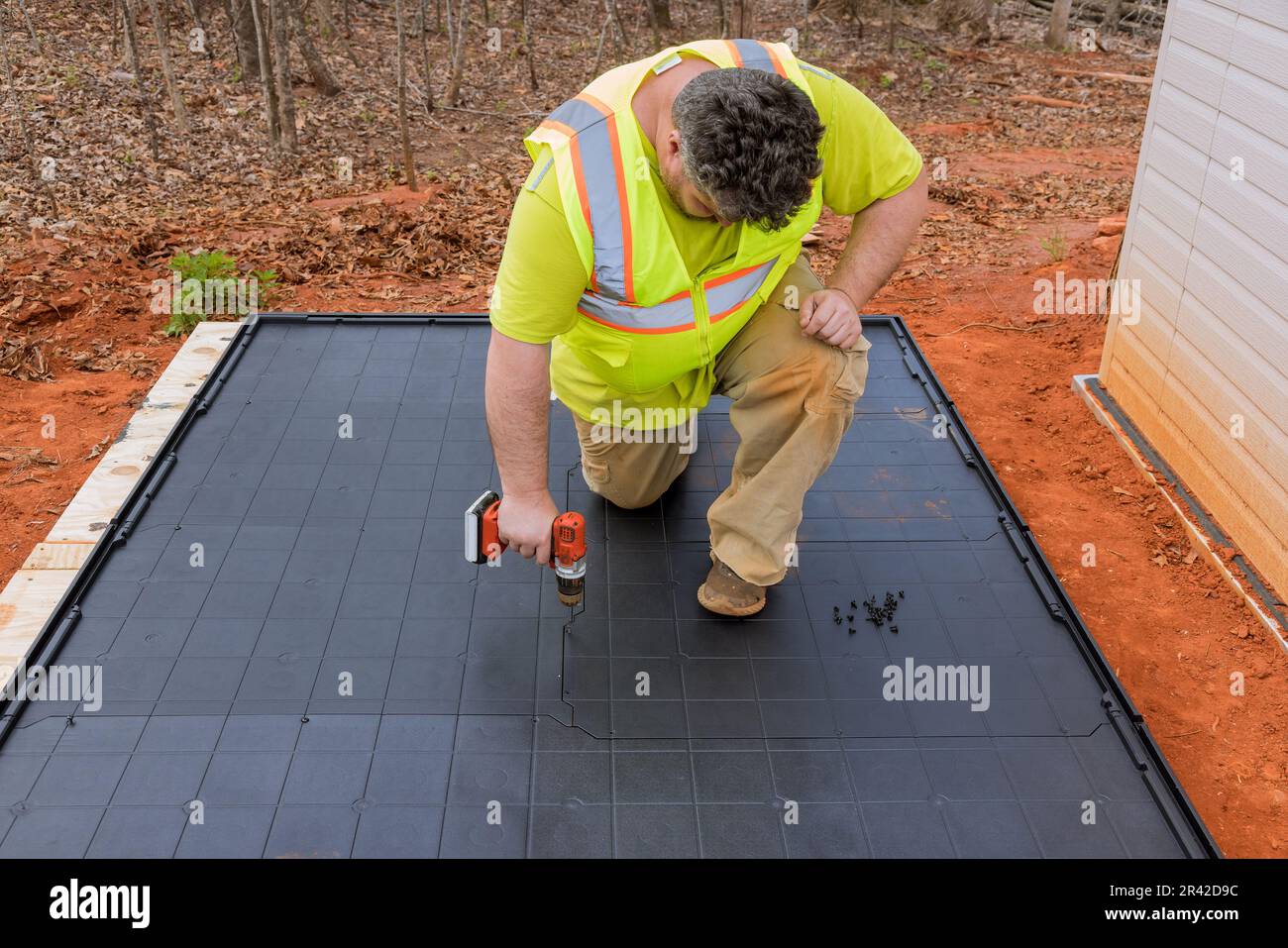 One of tasks involved in building plastic vinyl storage shed is ...