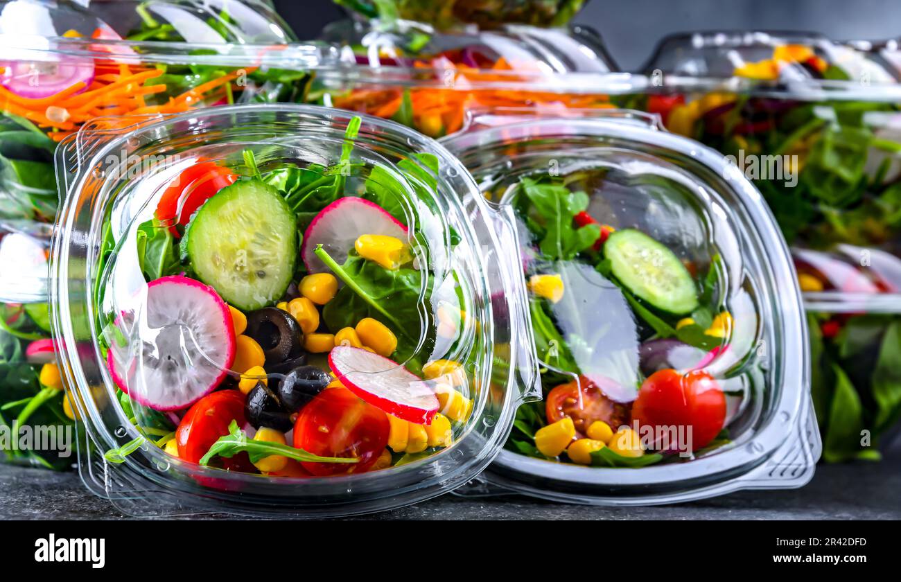 Plastic boxes with pre-packaged vegetable salads Stock Photo - Alamy