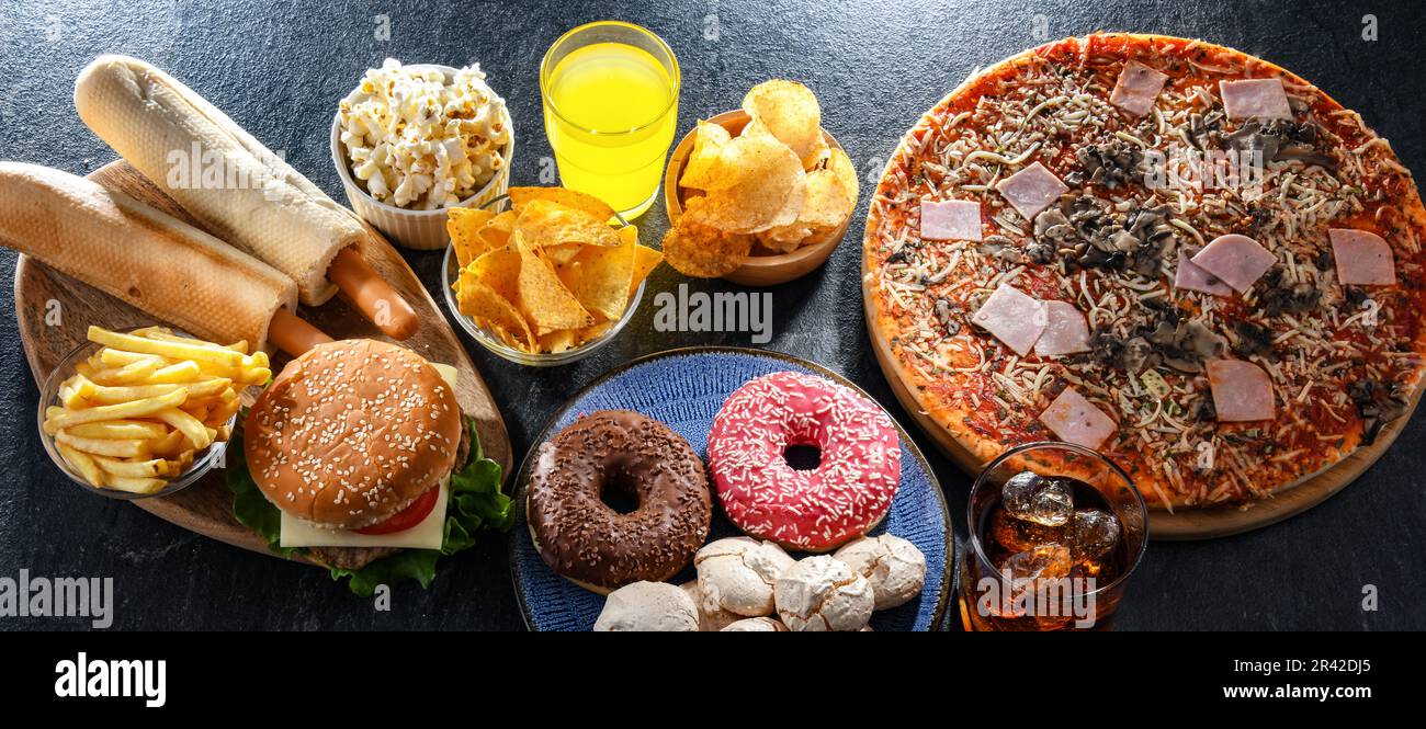 Foods enhancing the risk of cancer. Junk food Stock Photo - Alamy