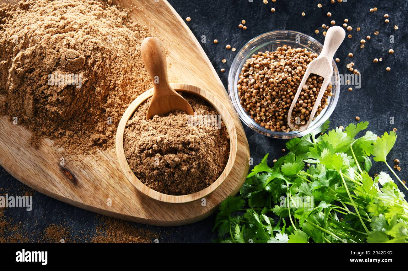 Composition with ground coriander Stock Photo - Alamy