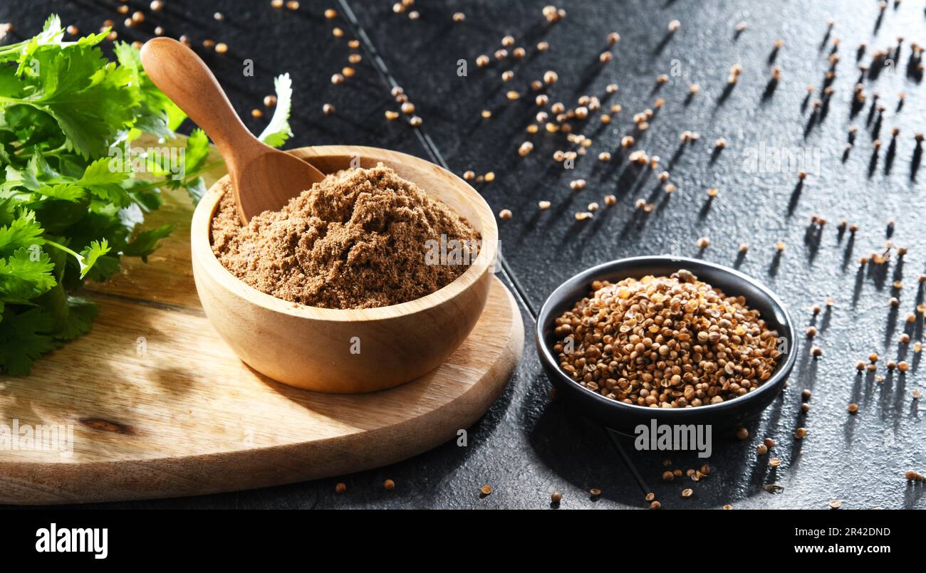 Composition with ground coriander Stock Photo - Alamy