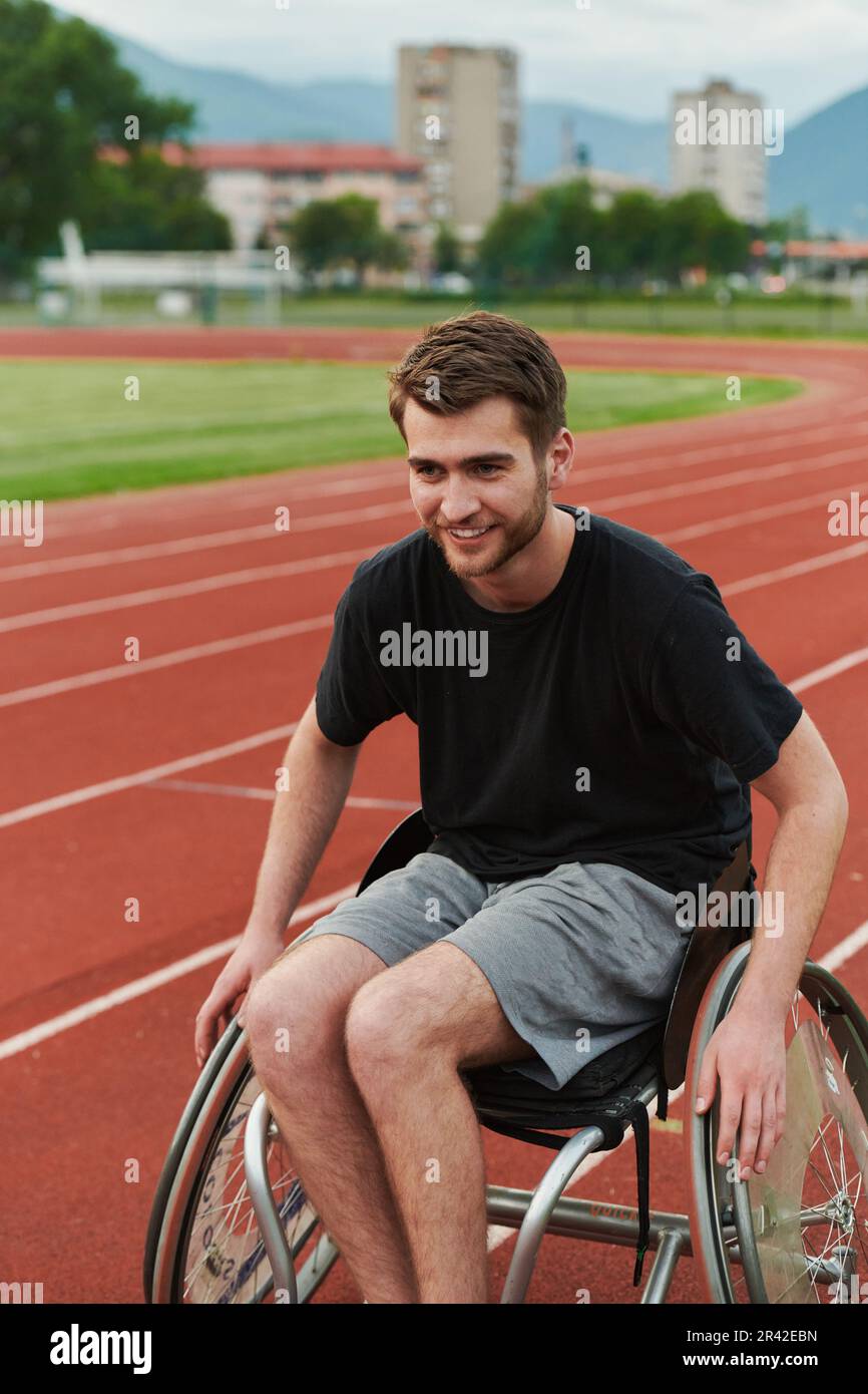 A person with disability in a wheelchair training tirelessly on the ...