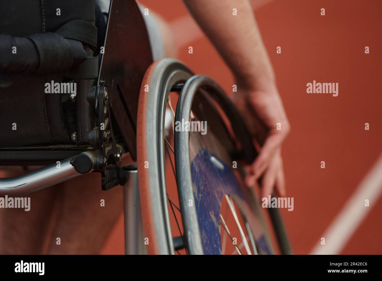 Close up photo of a person with disability in a wheelchair training ...