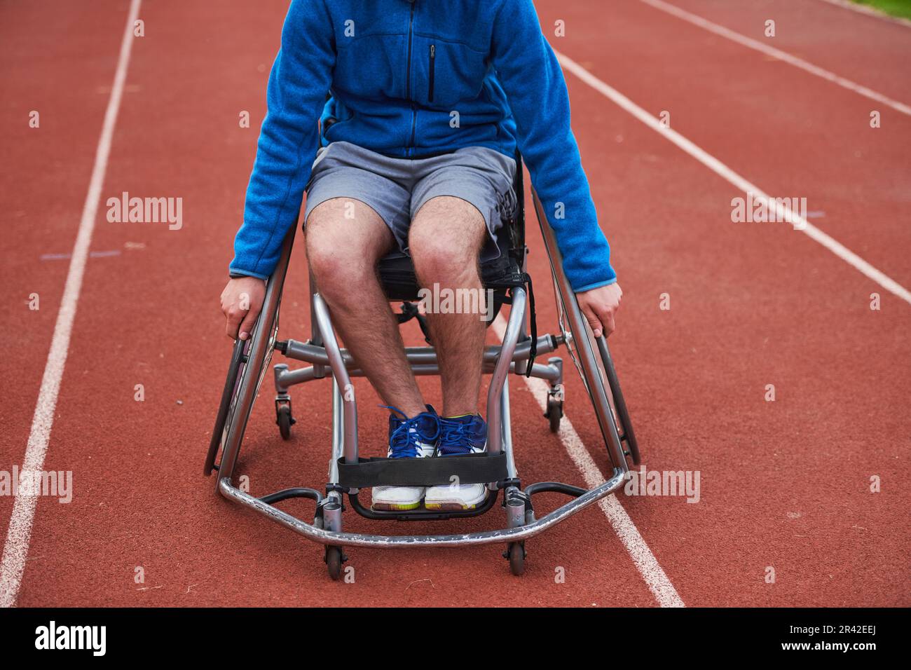 A person with disability in a wheelchair training tirelessly on the ...