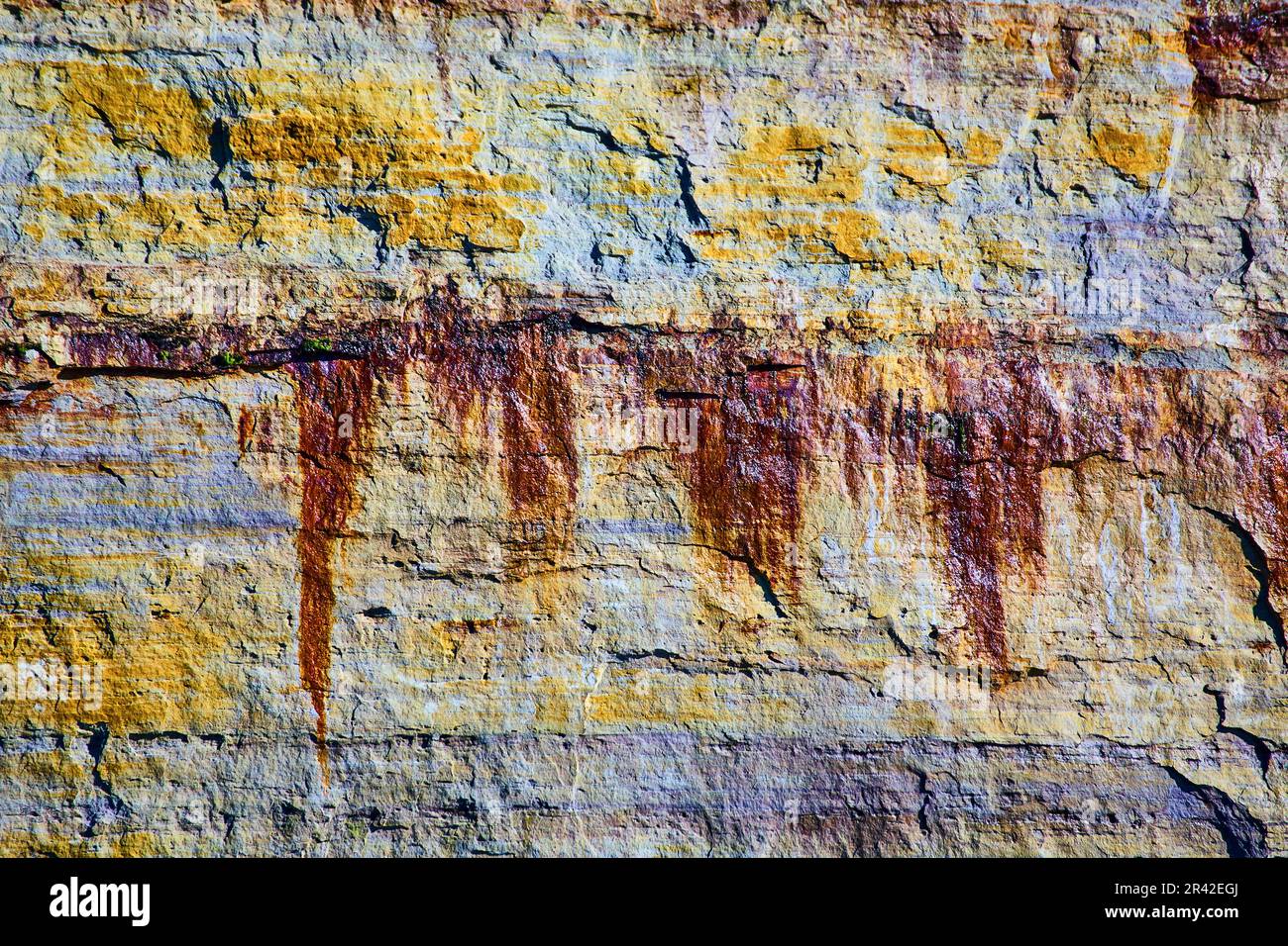 Background asset streaks of painted minerals on Pictured Rocks with ...