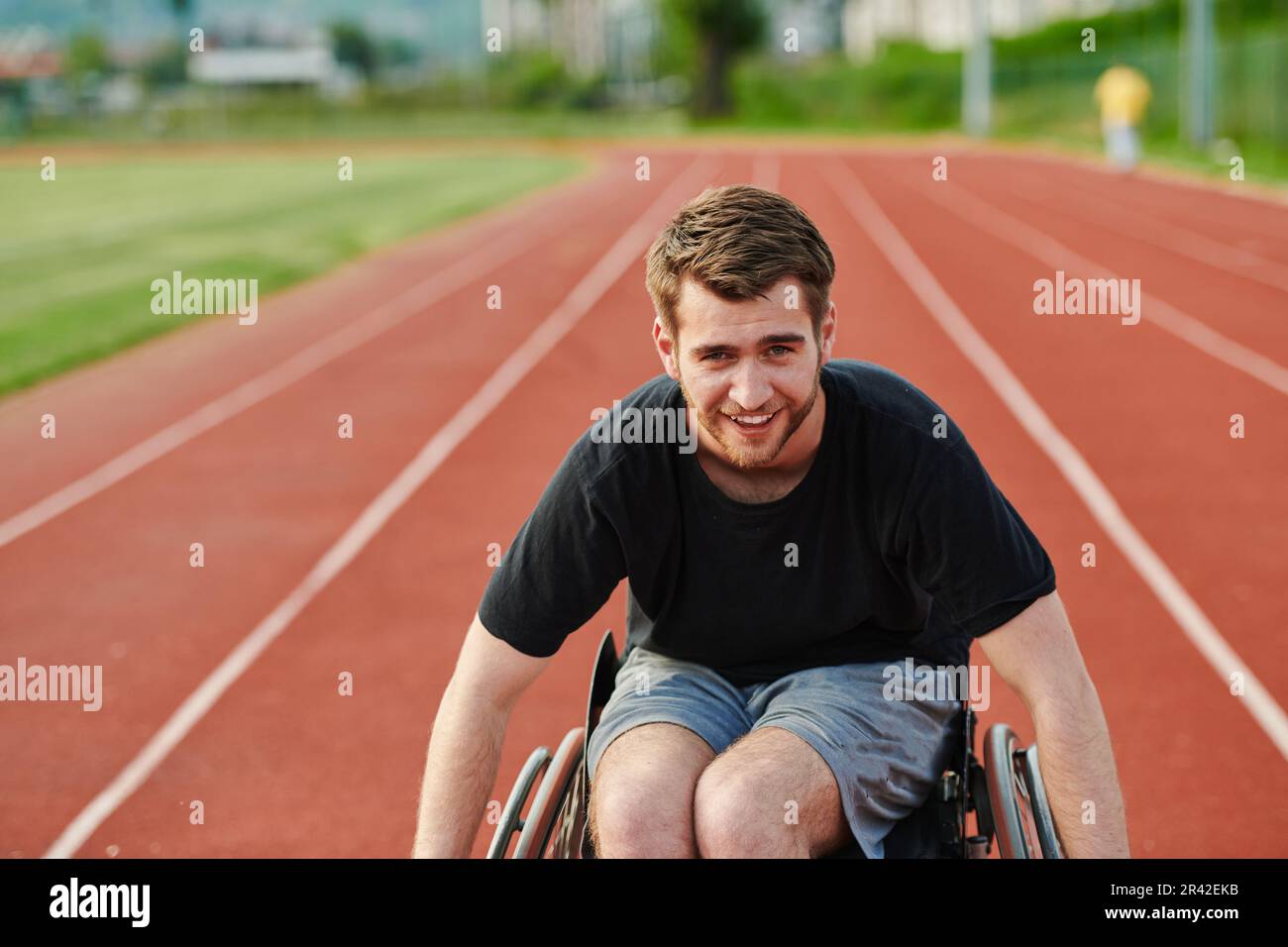 A person with disability in a wheelchair training tirelessly on the ...