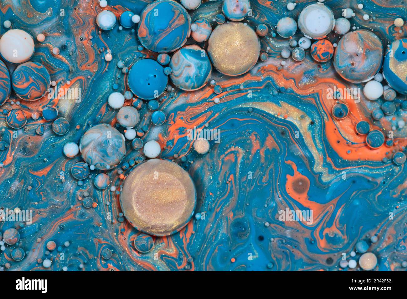 Golden eggs and easter eggs in abstract oil and acrylic background ...