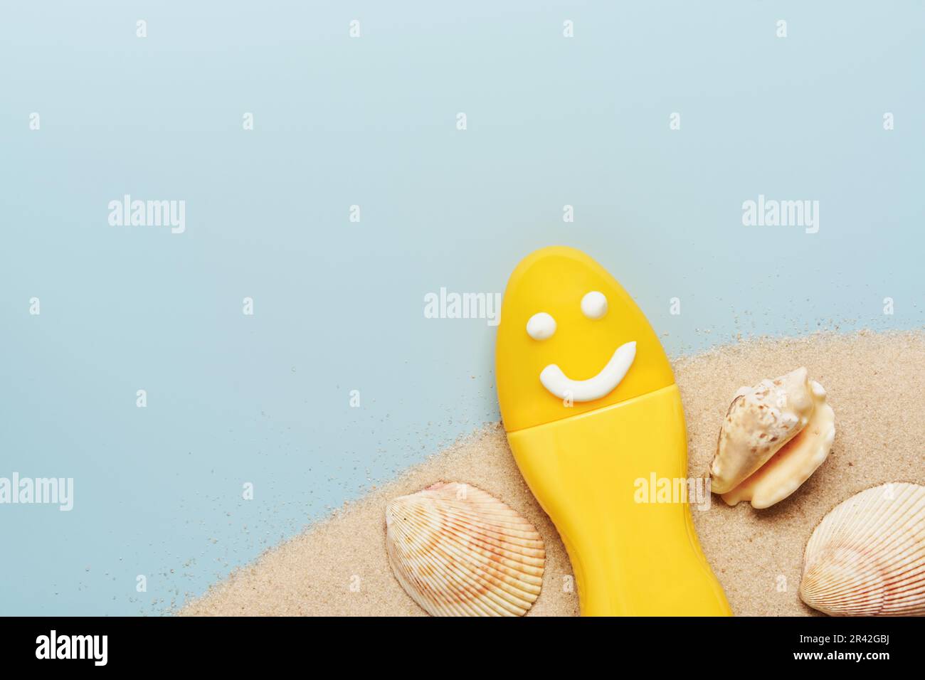 Yellow tube with happy sunscreen face. Sun Ultraviolet protection ...