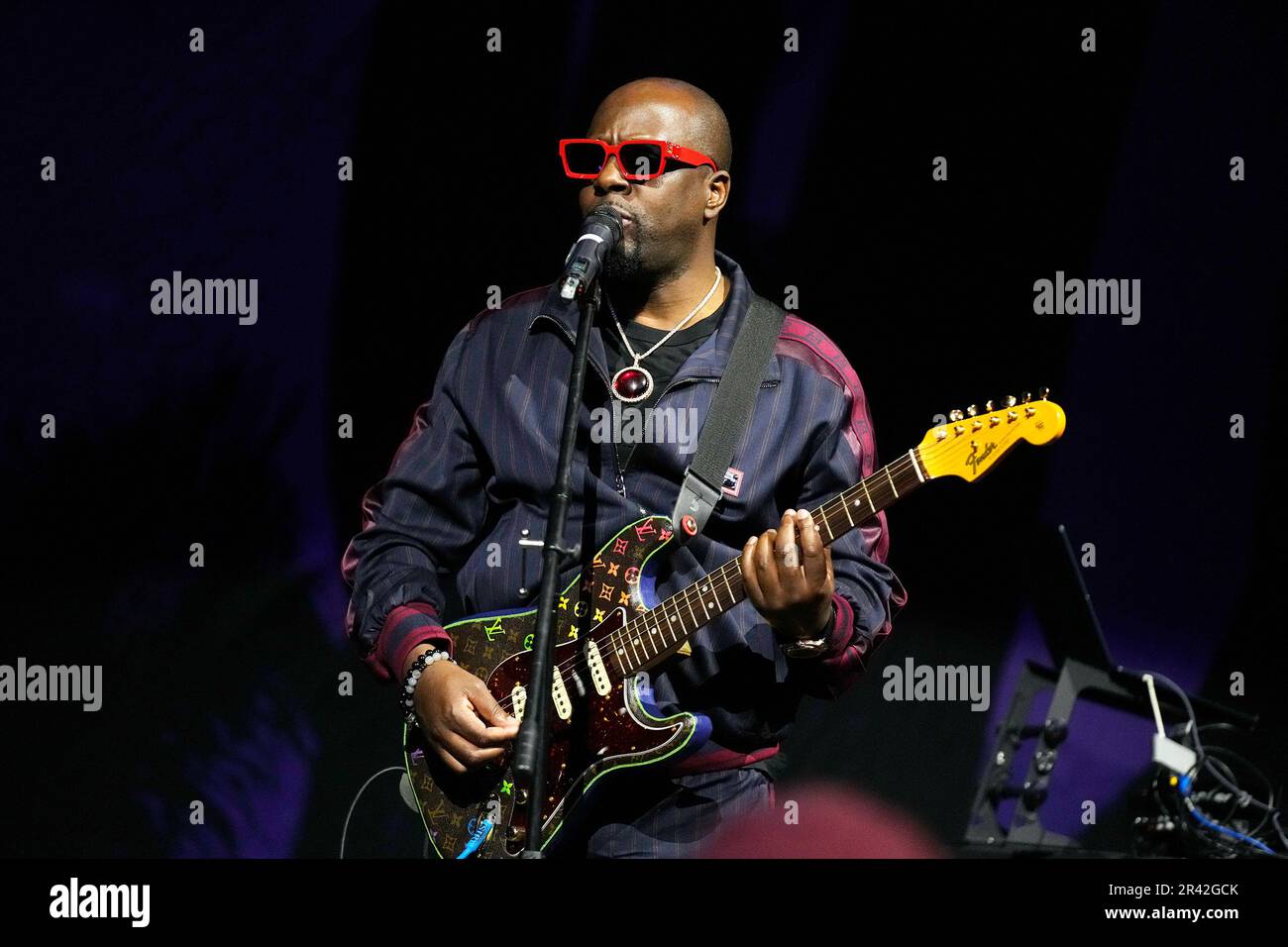 Singer and activist Wyclef Jean performs after a WNBA basketball game ...