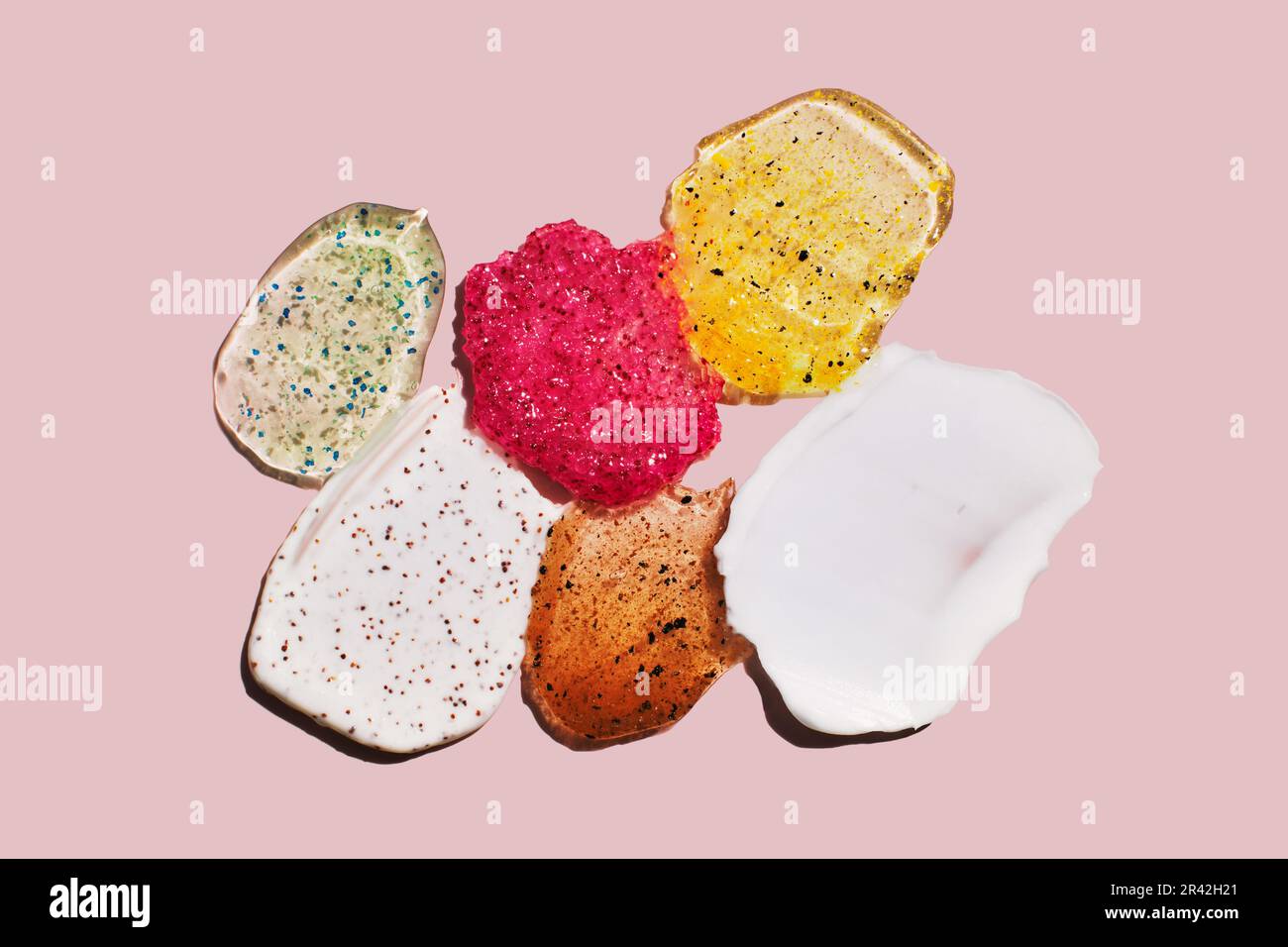 Different natural cosmetic products Swatches set with particles. Face ...