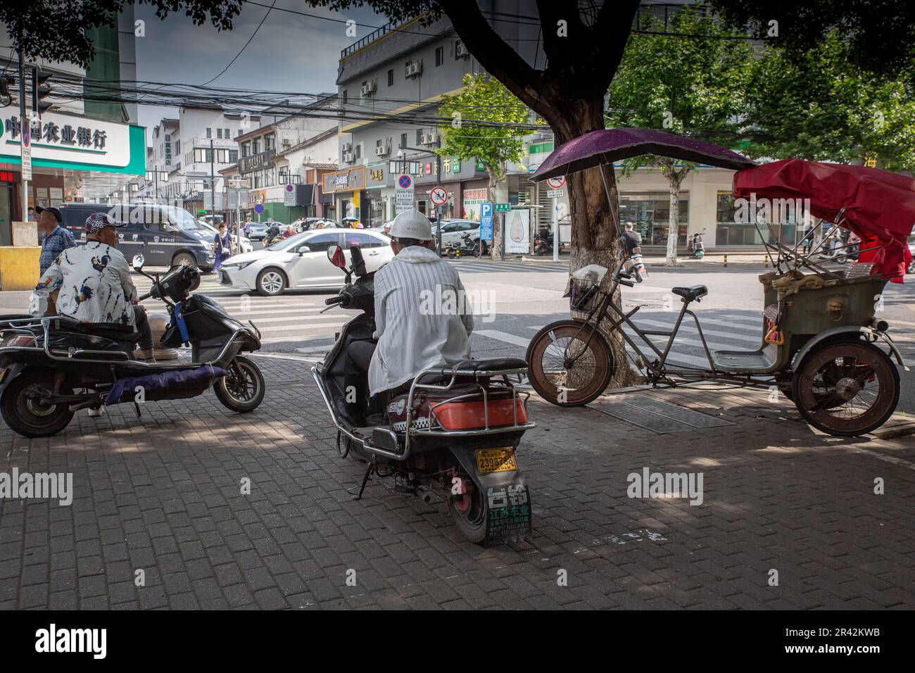 Rickshaw drivers corner of Pishi Street, Gusu District, Suzhou, Jiangsu ...
