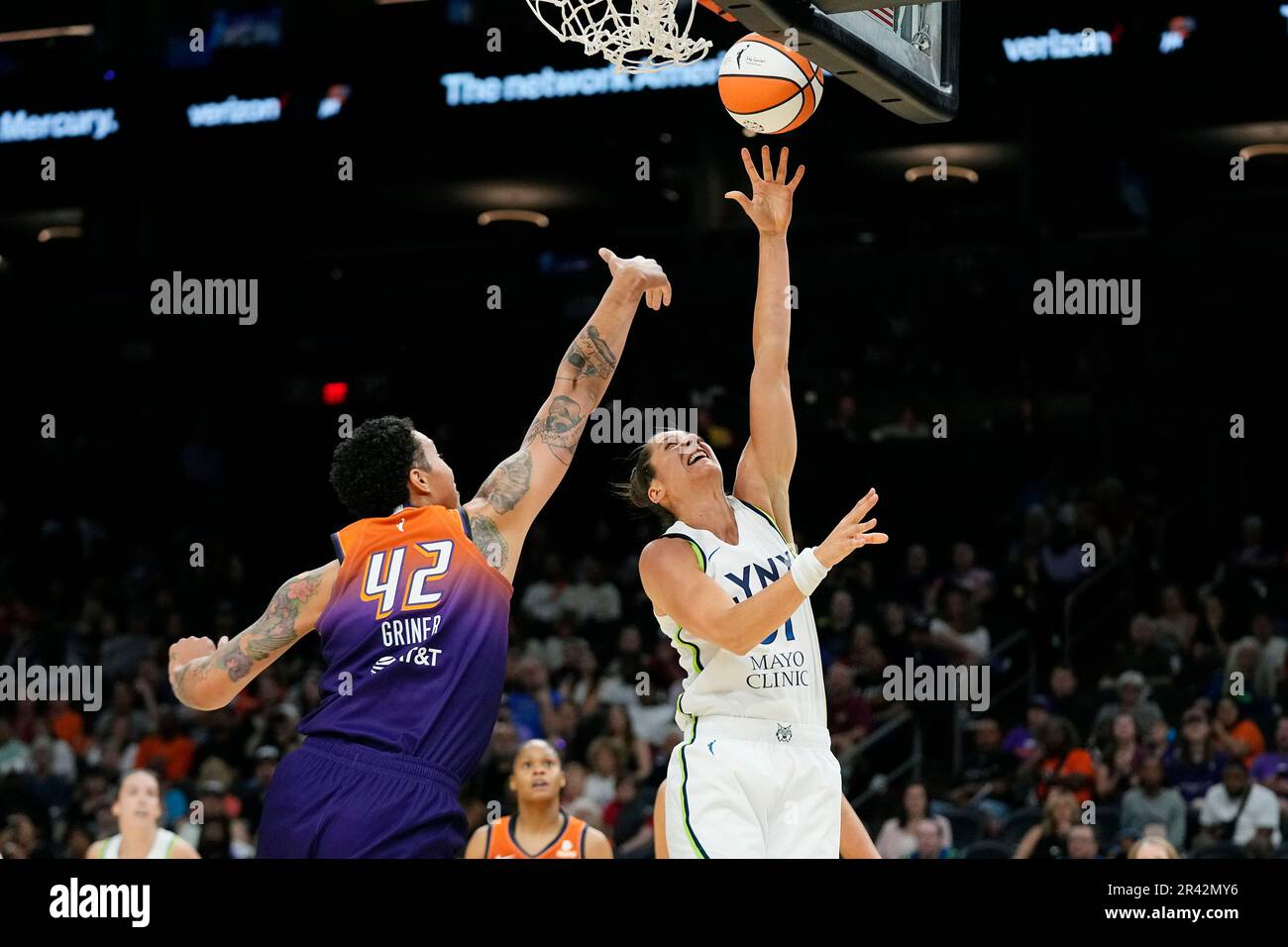 Minnesota Lynx center Nikolina Milic, right, scores against Phoenix ...