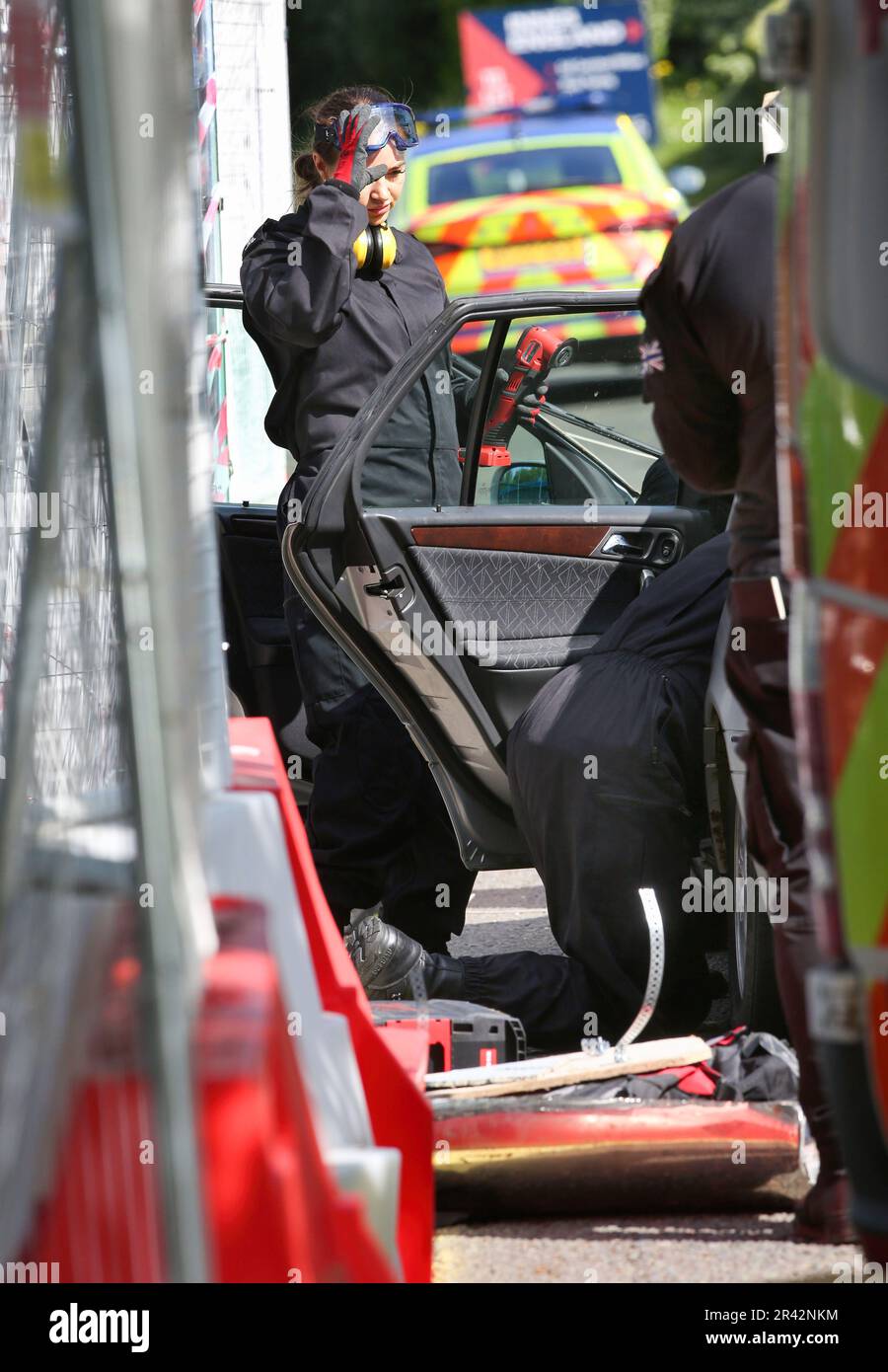 Specialist police officers use cutting tools to remove protesters from ...