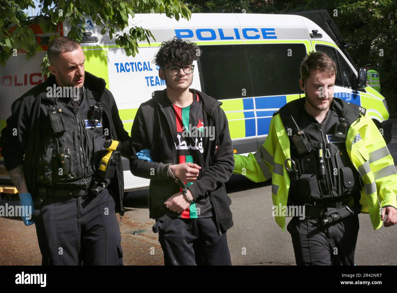 An activist from Palestine Action is arrested after a gate blocking ...