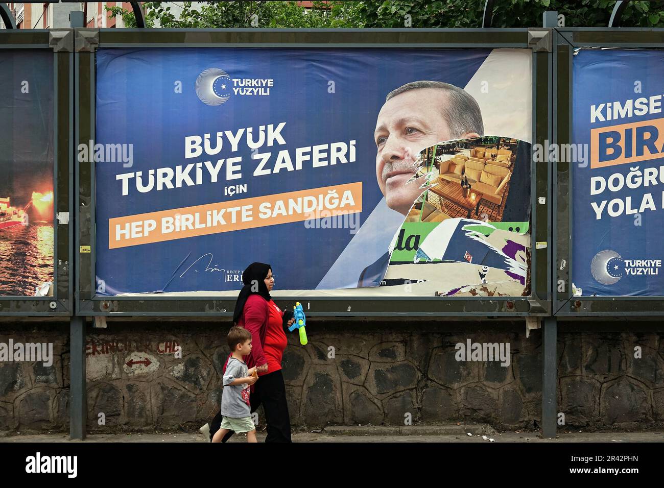 One of the torn posters of presidential candidate and Justice and ...