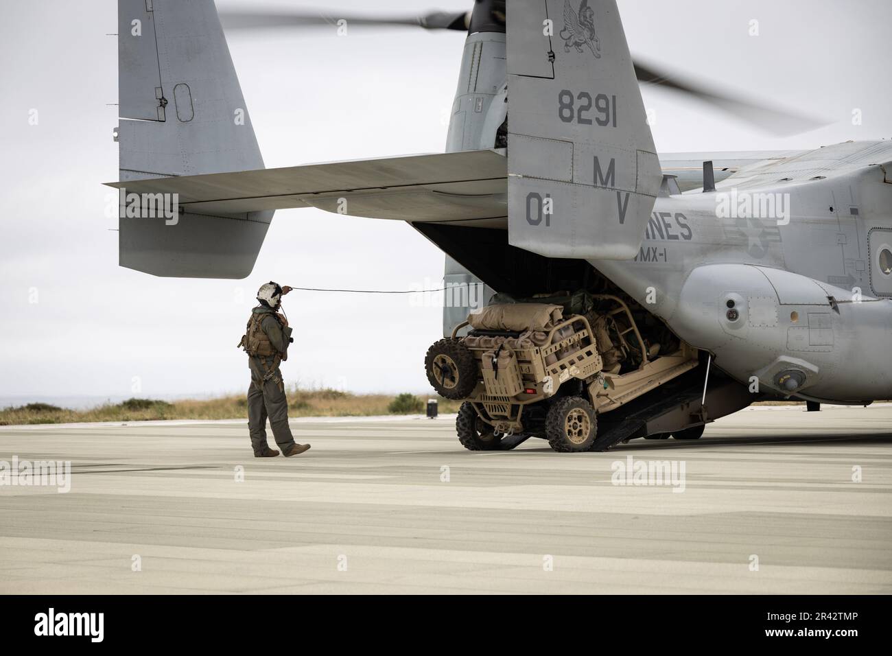 A U.S. Marine assigned to Marine Test and Evaluation Squadron (VMX) 1 ...